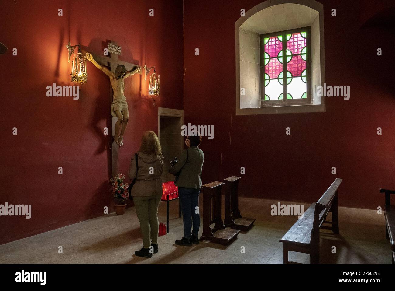 Women praying, Sanctuary of the Miracle, Riner, Catalonia, Spain Stock ...