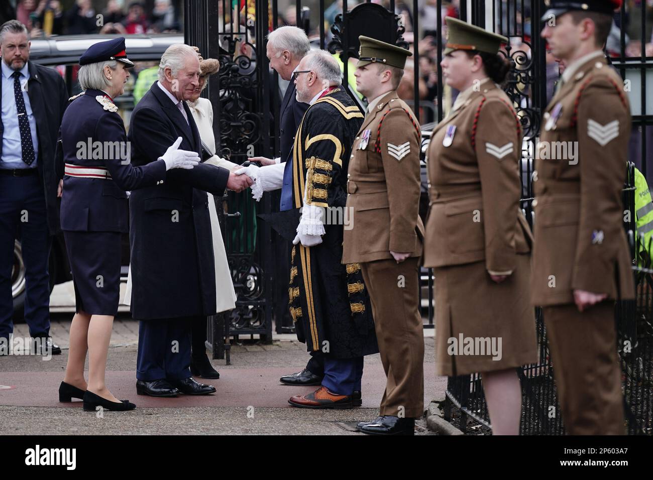 King Charles III and the Queen Consort meet dignitaries and military ...