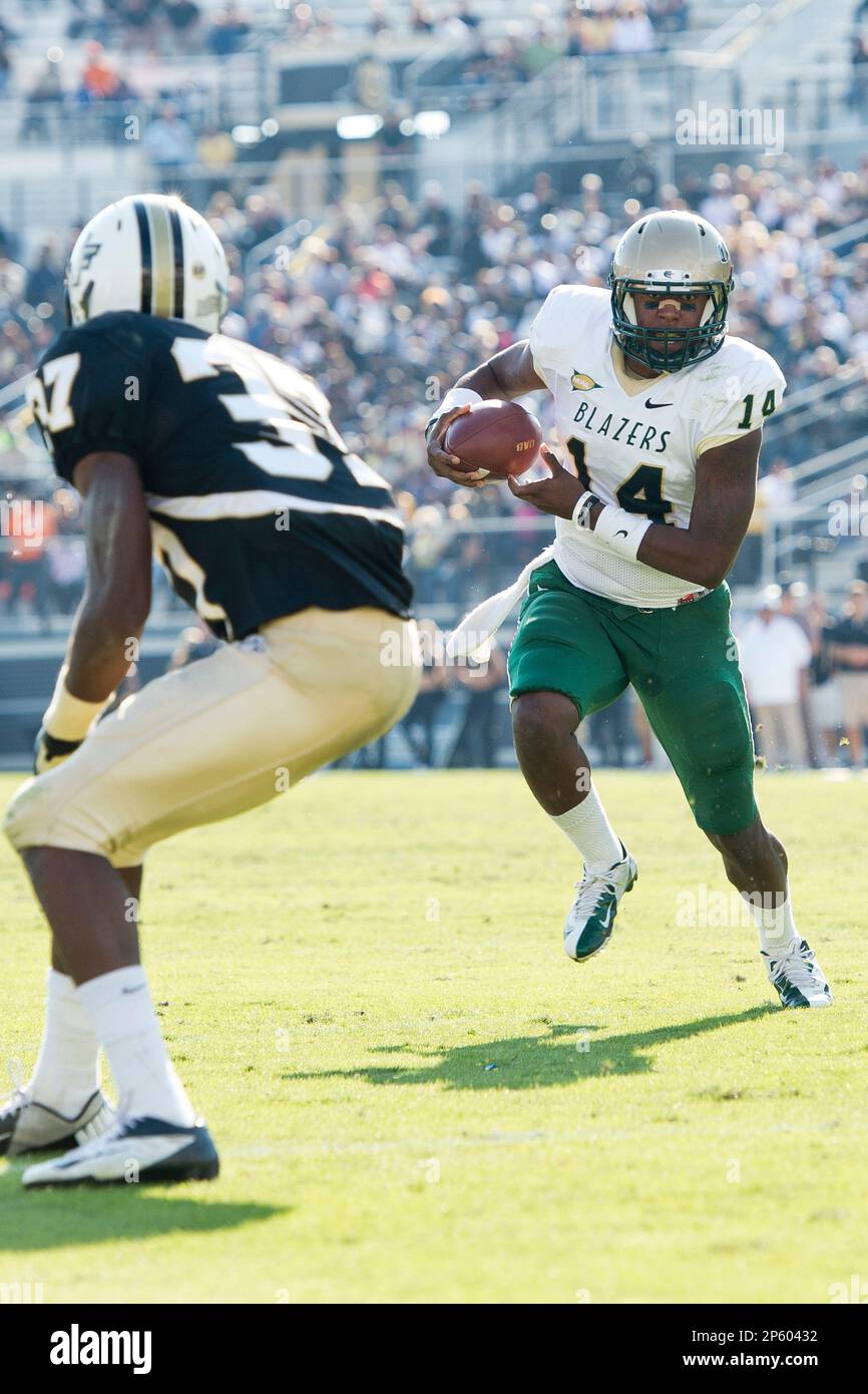 November 24 2012 UAB Blazers quarterback Jonathan Perry 14 scores on a 2 yard run during 2nd half NCAA football game action between the UAB Blazers and the Central Florida Knights. Central