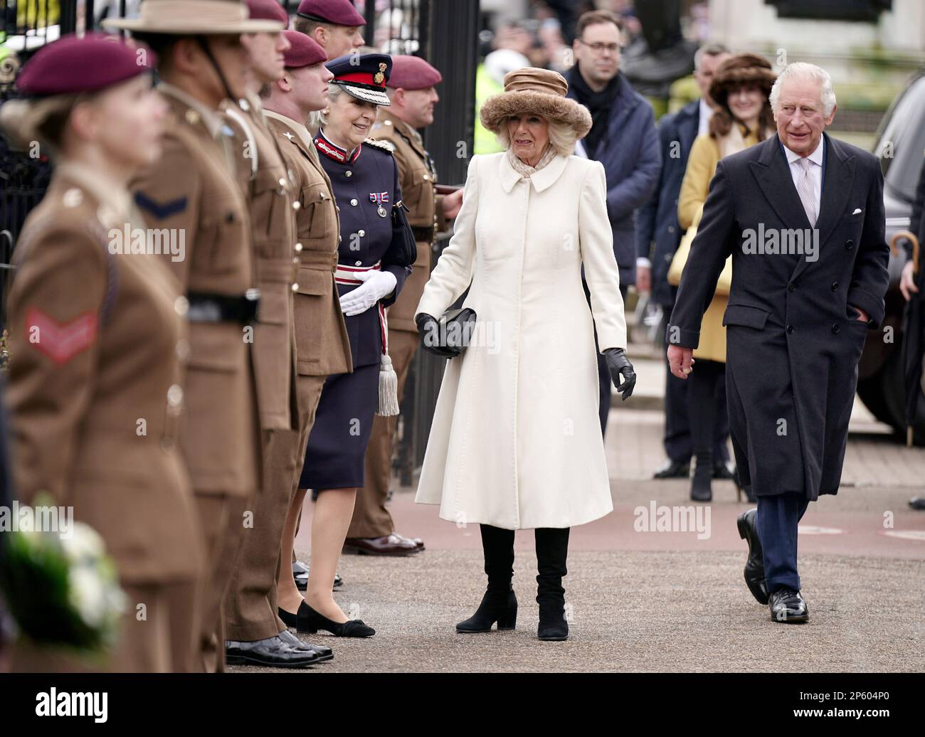King Charles III and the Queen Consort meet dignitaries and military ...