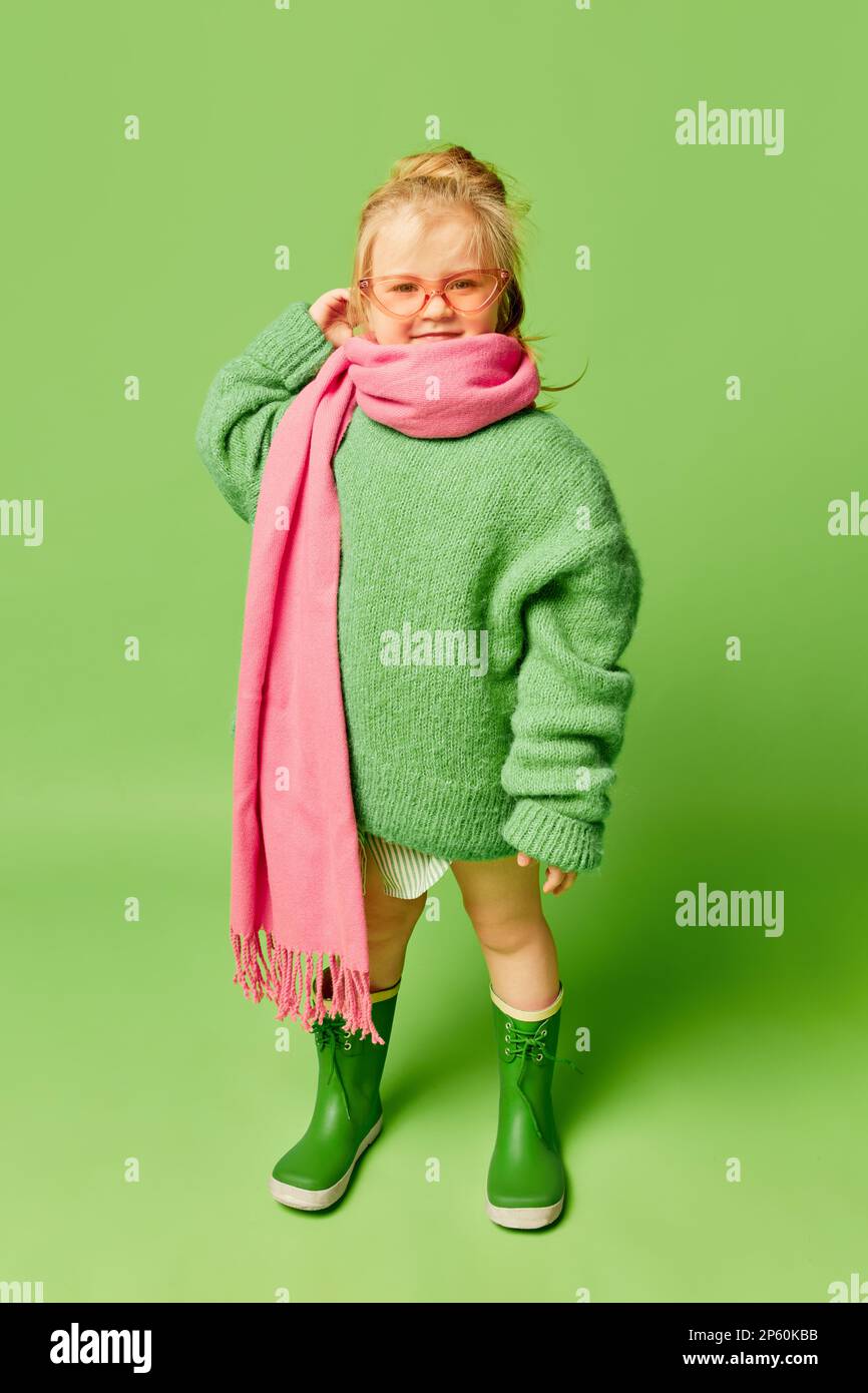 Happy smiling cute kid, little girl in fashionable look clothes and ...