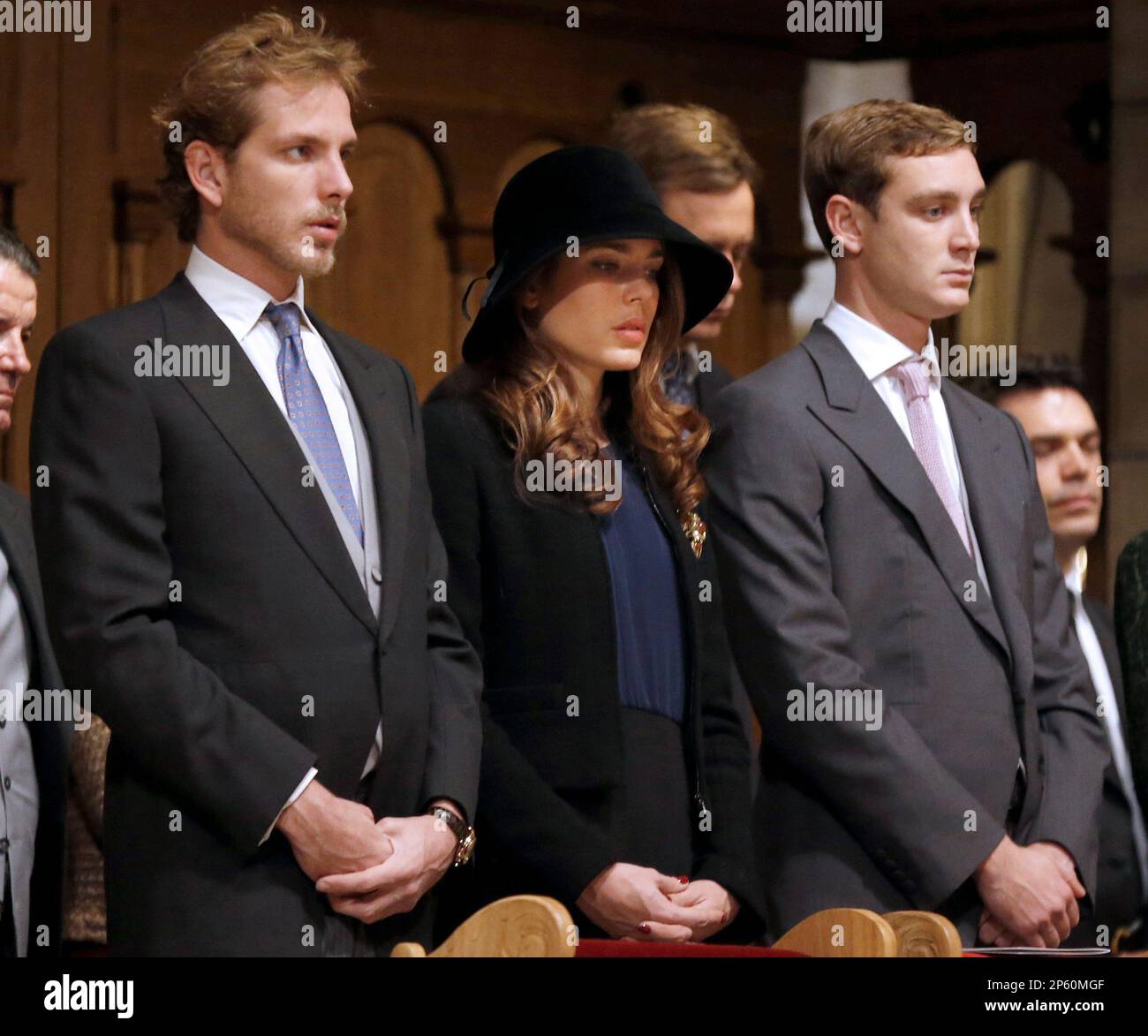 Andrea, Charlotte and Pierre Casiraghi stand in the cathedral for a ...