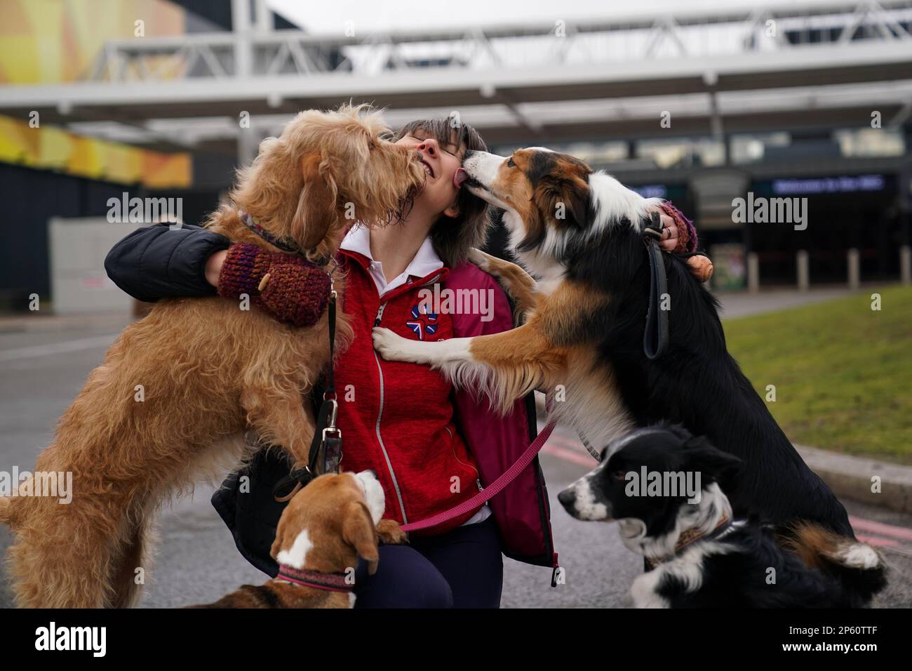 Trainer Lucy Creek with her dogs during a photo call for launch of this ...