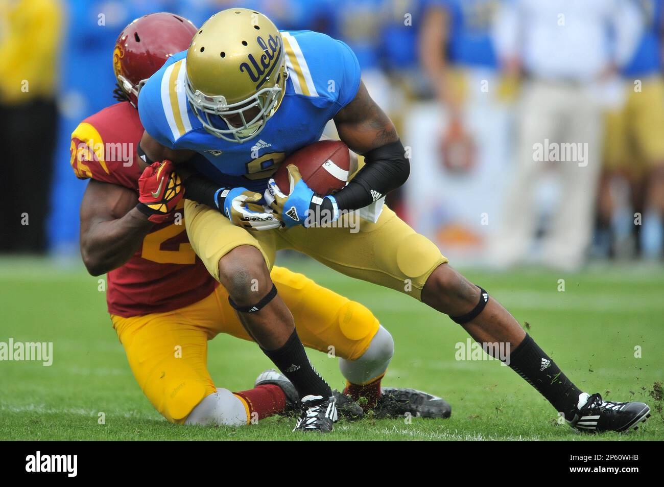 November 17 2012 Pasadena, CA..UCLA's Jerry Johnson #9 catches a pass ...