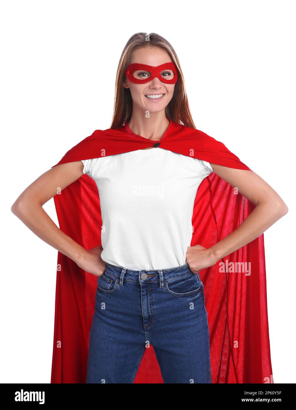 Confident woman wearing superhero cape and mask on white background ...