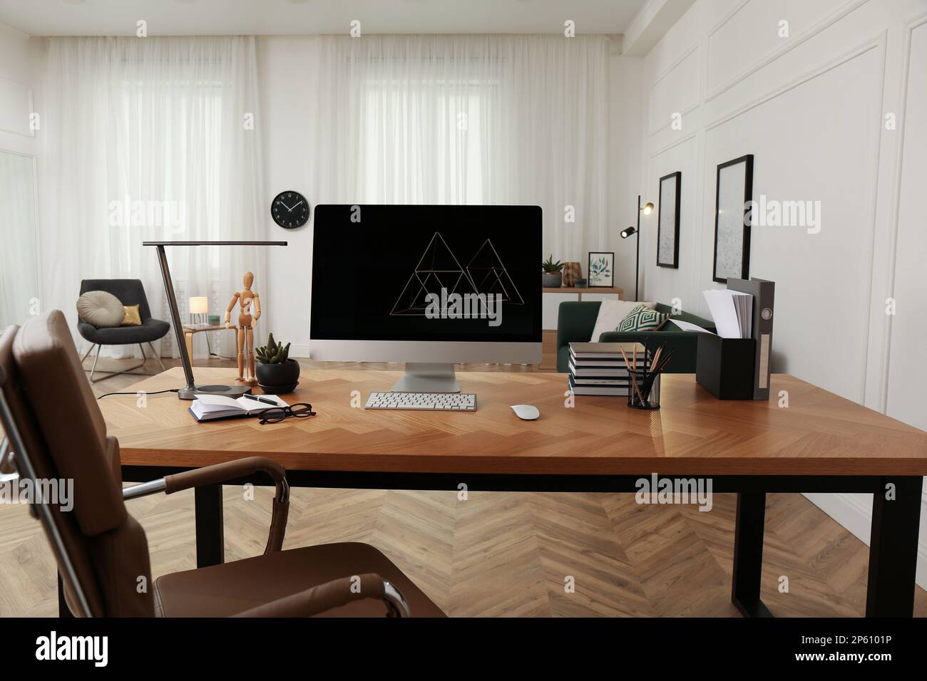 Workplace with computer on wooden desk in light room. Modern interior ...
