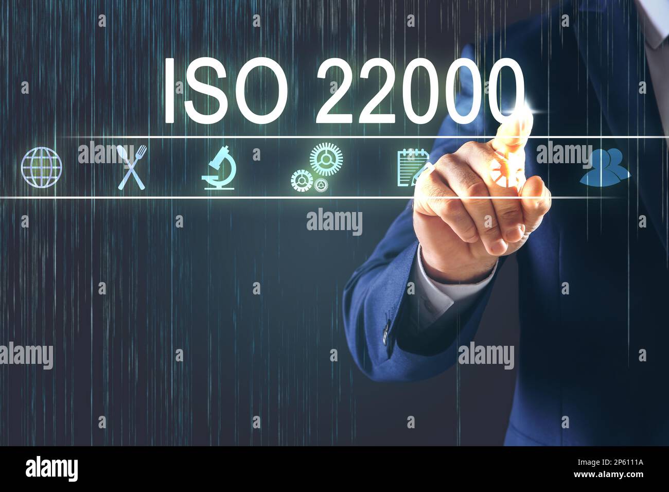 Man pointing at virtual screen with text ISO 22000 and different icons ...