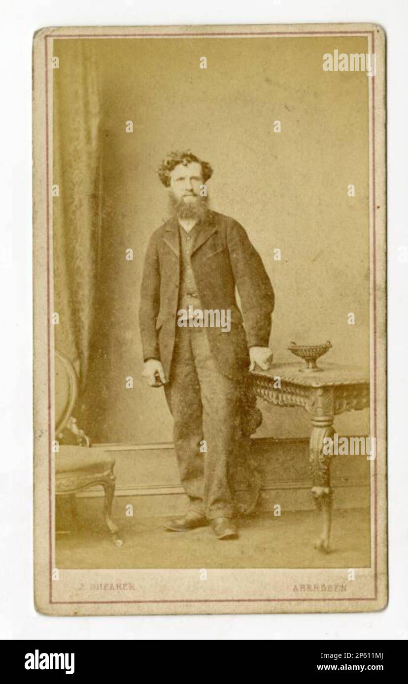 Standing man with square cut beard, 1880s Stock Photo - Alamy