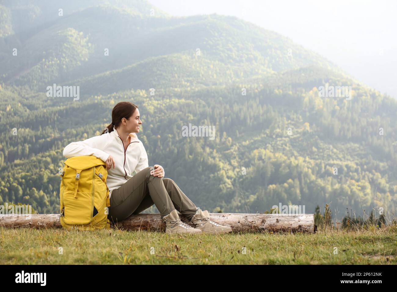 Woman hiker resting near hi-res stock photography and images - Alamy