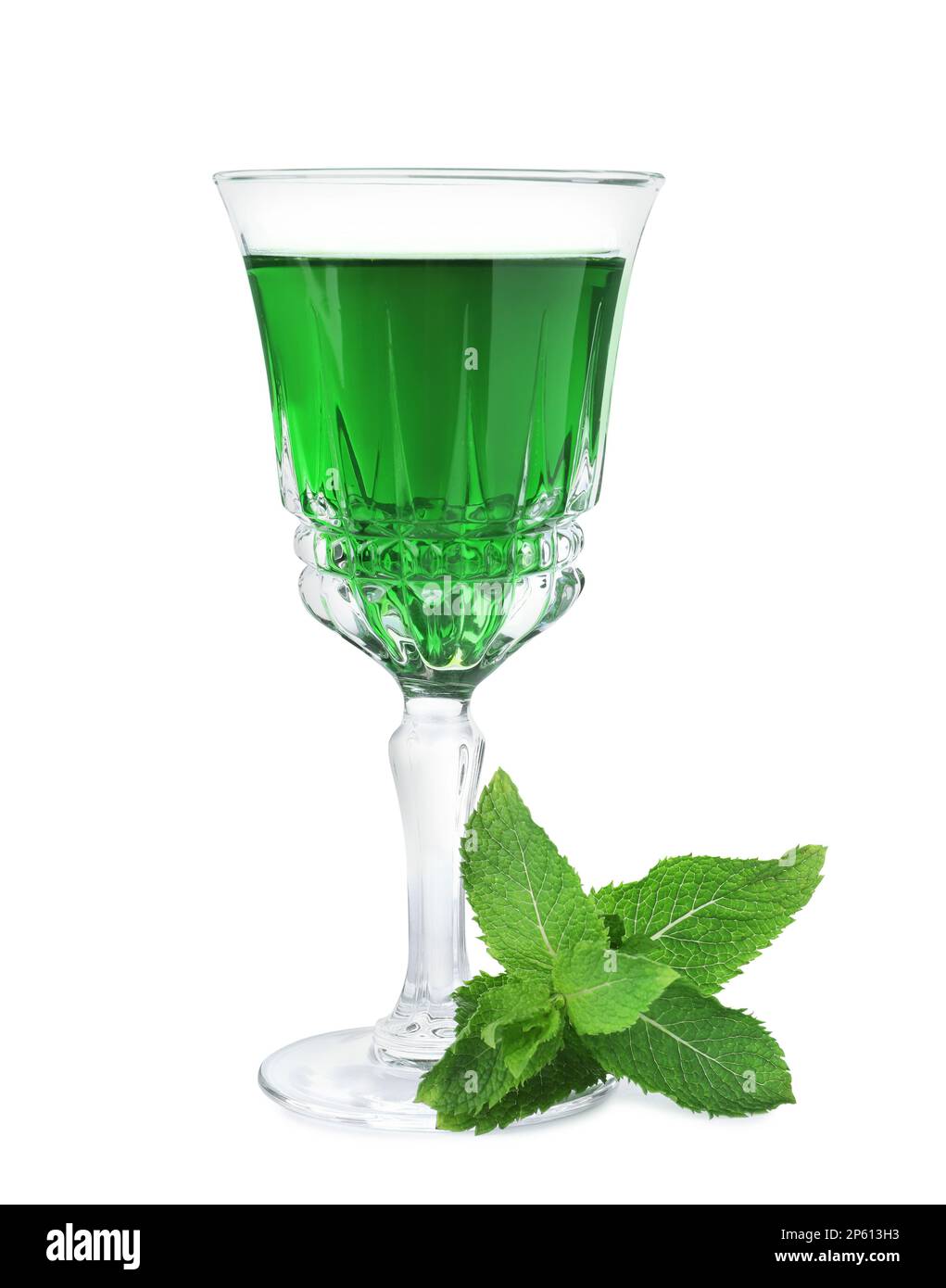 Delicious mint liqueur and fresh leaves isolated on white Stock Photo ...