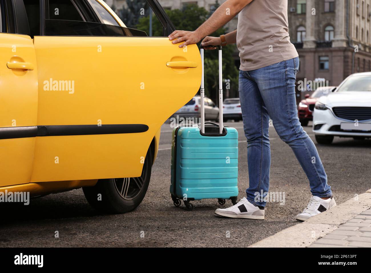 Man suitcase open door hi-res stock photography and images - Alamy