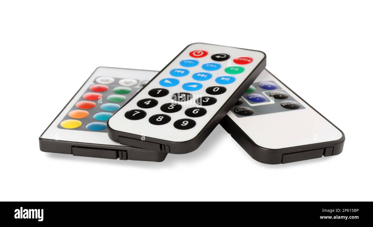 Different modern remote controls on white background Stock Photo - Alamy