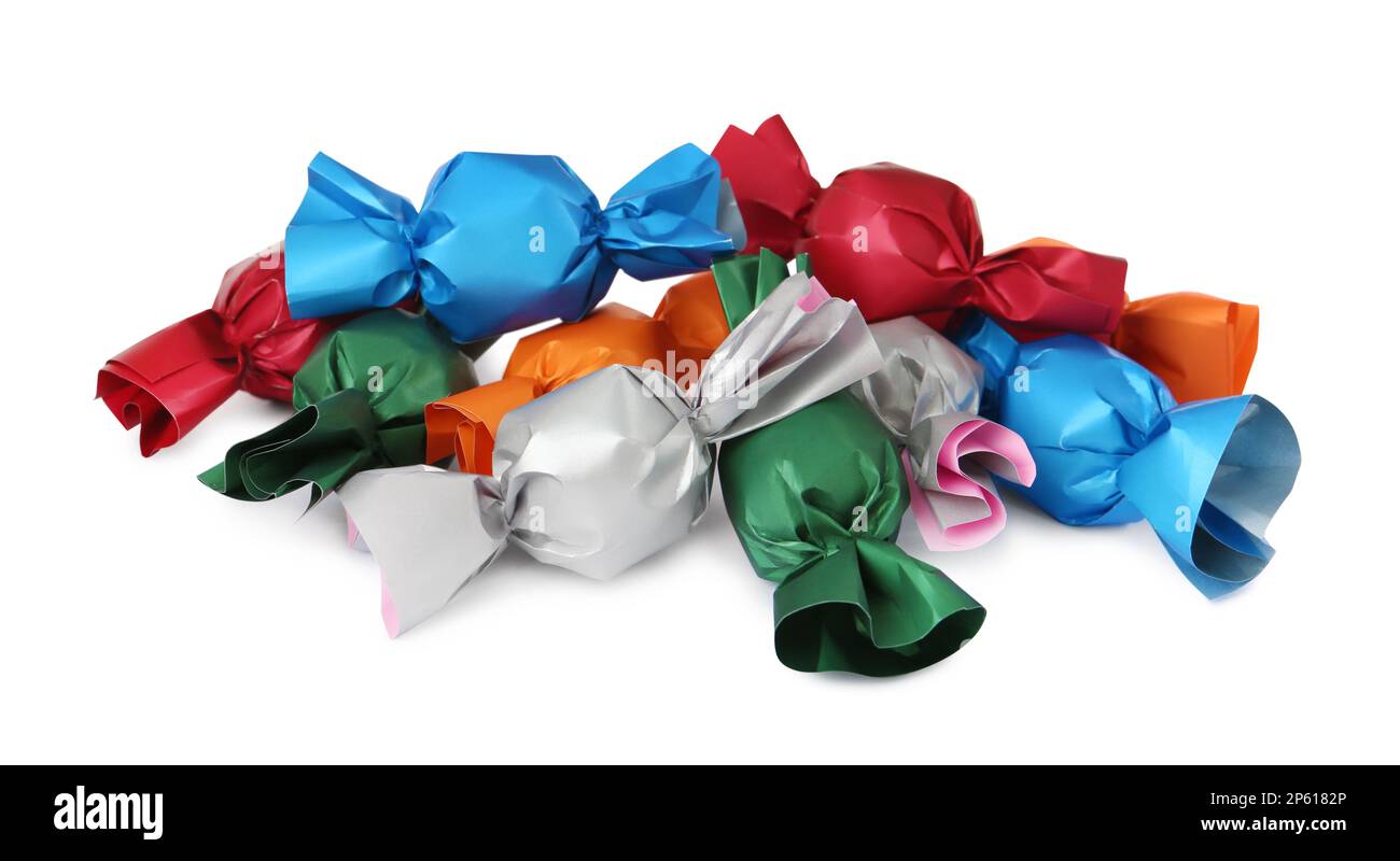 Many candies in colorful wrappers on white background Stock Photo - Alamy
