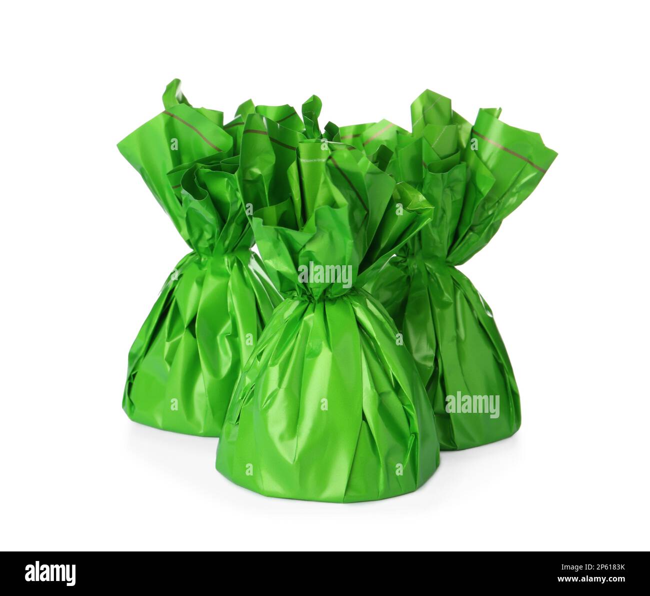 Delicious candies in green wrappers on white background Stock Photo - Alamy