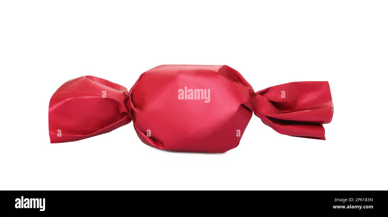 Delicious candy in red wrapper isolated on white Stock Photo - Alamy