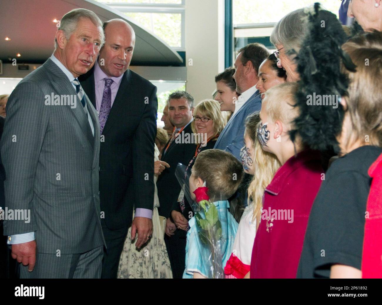 Britain's Prince Charles, left, with Artistic Director Tim Bray attends ...