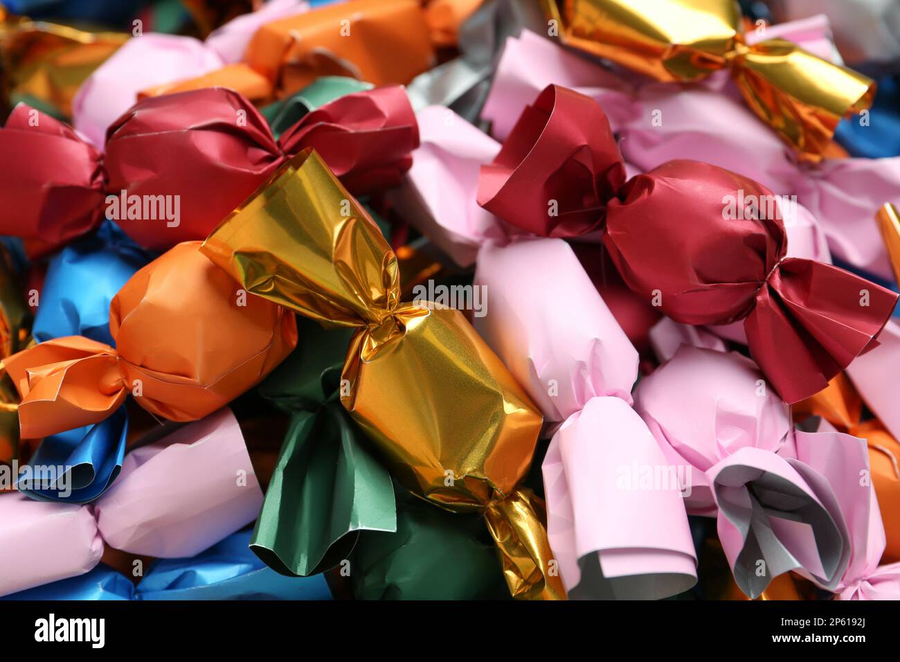 Many candies in colorful wrappers as background, closeup Stock Photo ...