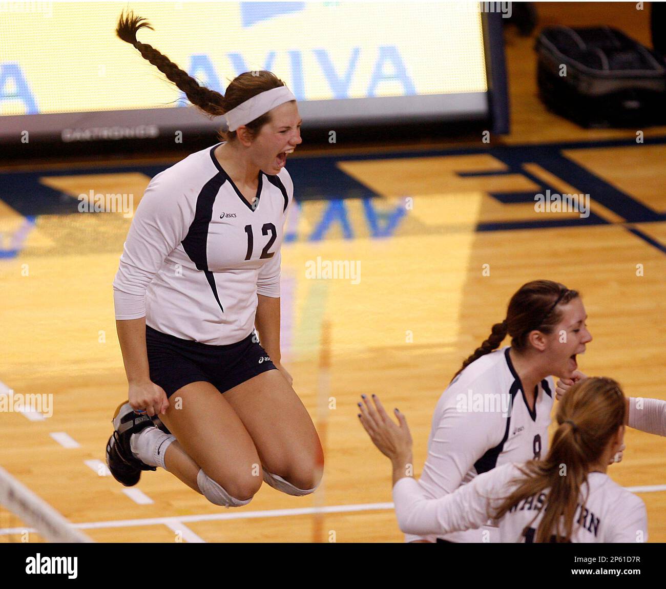 Washburn's Jessica Kopp (12) celebrates a point during the first match ...