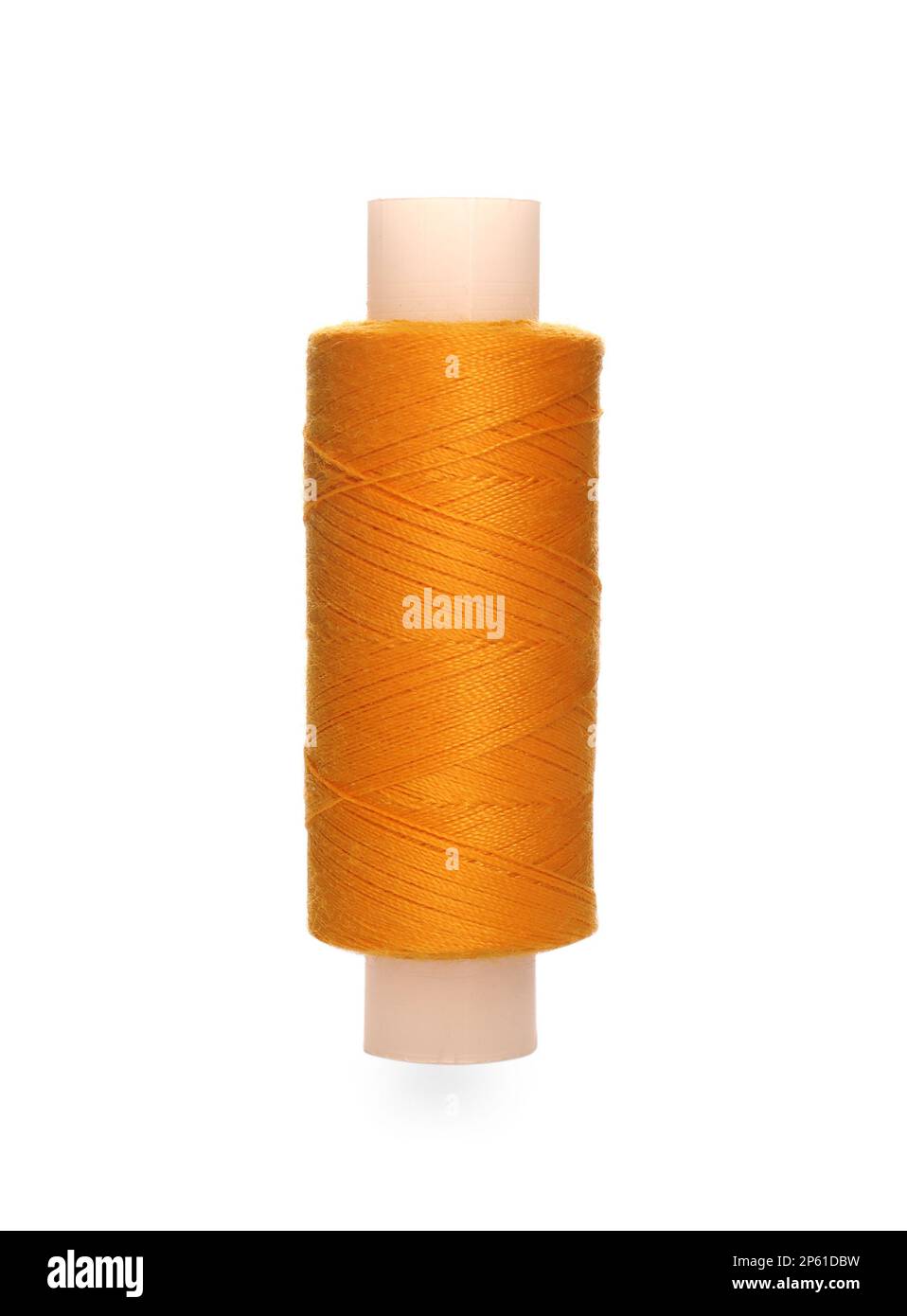 Spool of orange sewing thread isolated on white Stock Photo - Alamy