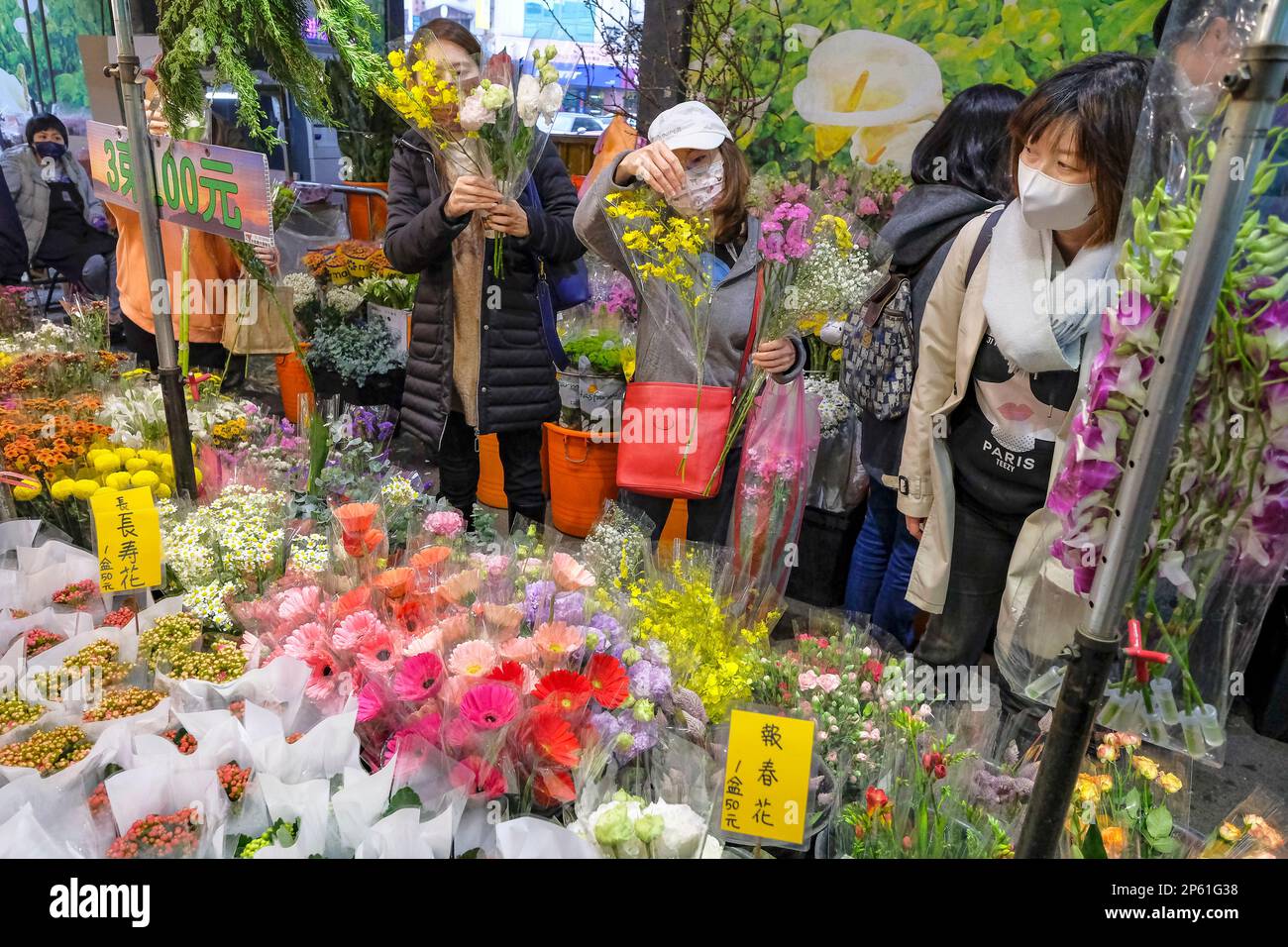 Taipei, Taiwan - February 25, 2023: Women buying flowers at the Jianguo ...