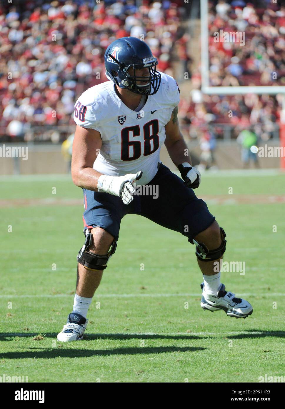 Arizona Wildcats Mickey Baucus (68) in action during a game against ...