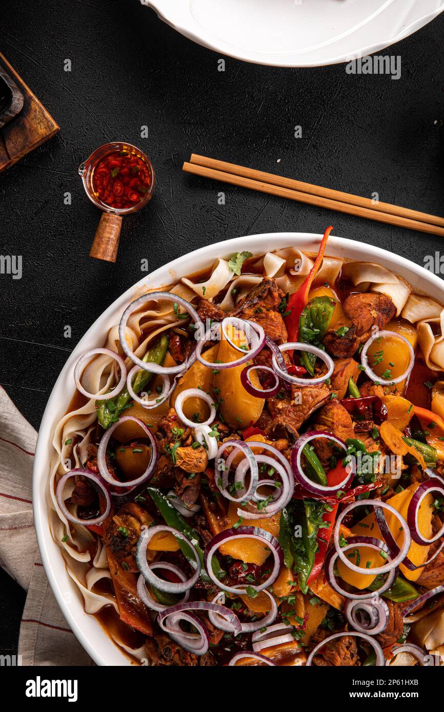 Chinese dapanji dish with stewed chicken Stock Photo - Alamy