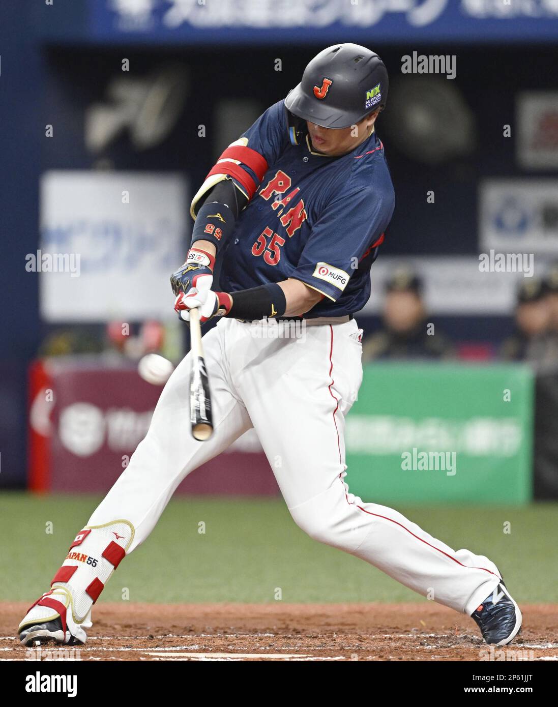 Munetaka Murakami of Japan's national baseball team hits a three-run ...