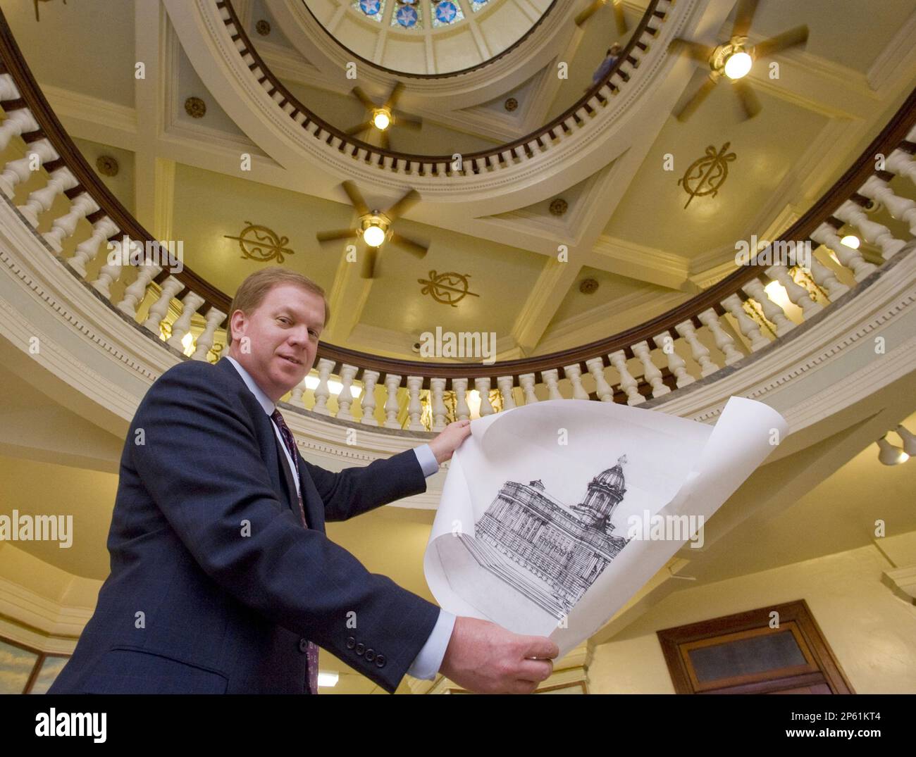 District judge Matt Johnson holds a early drawing of the McLennan ...
