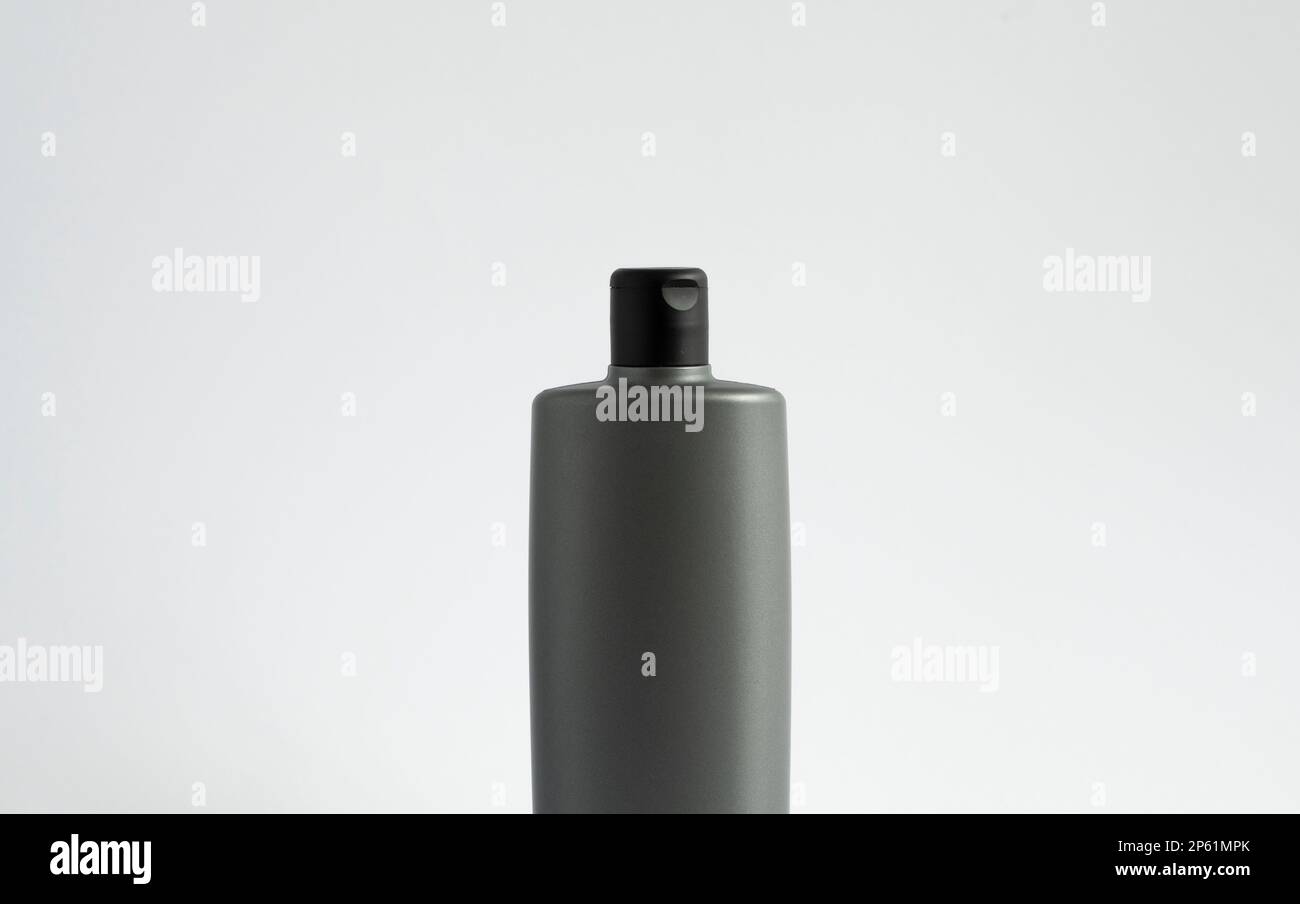 Black shampoo packaging mockup. Vertical empty plastic cosmetic package ...