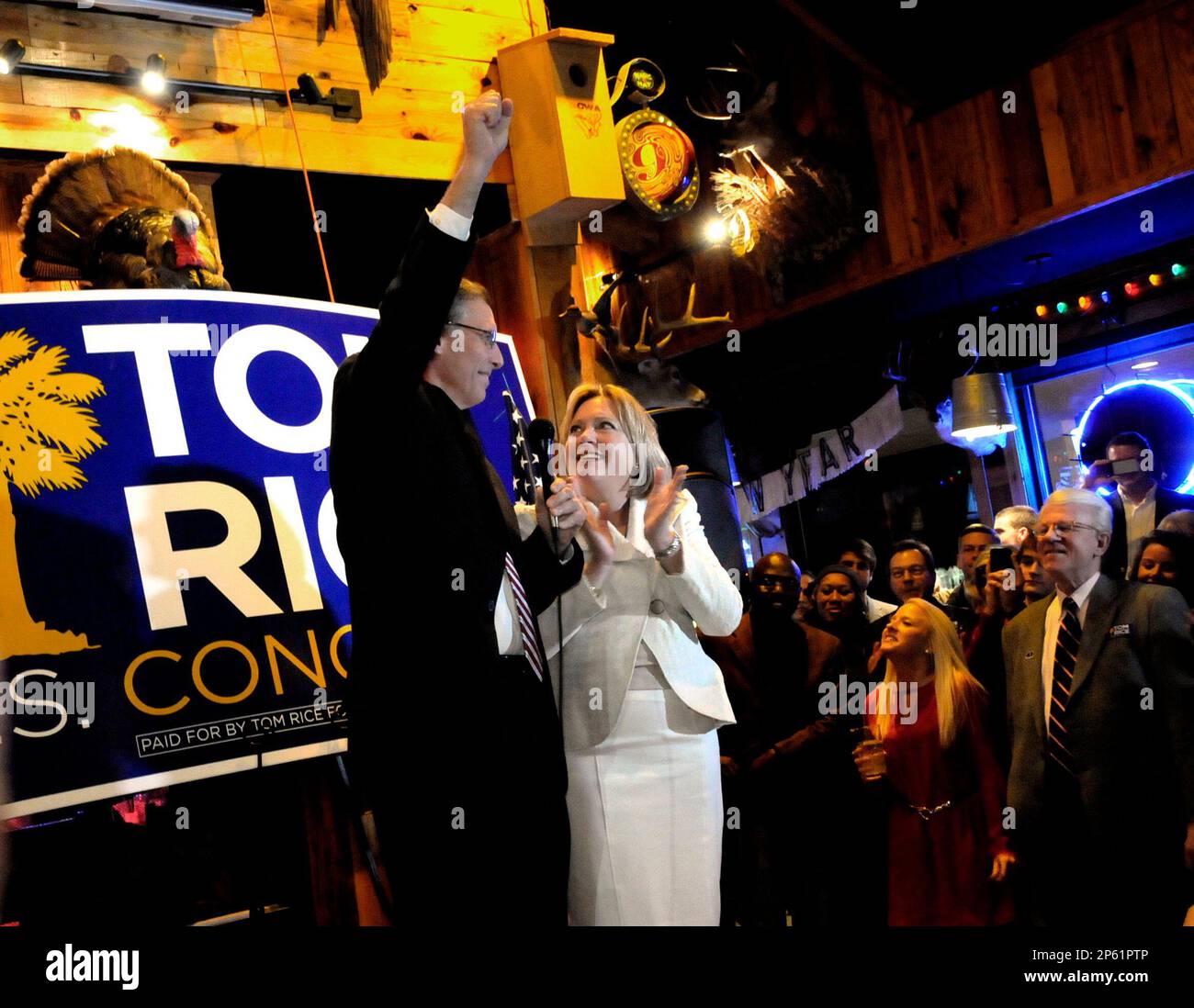 Republican Tom Rice and his wife, Wrenzie, celebrate after his win over ...