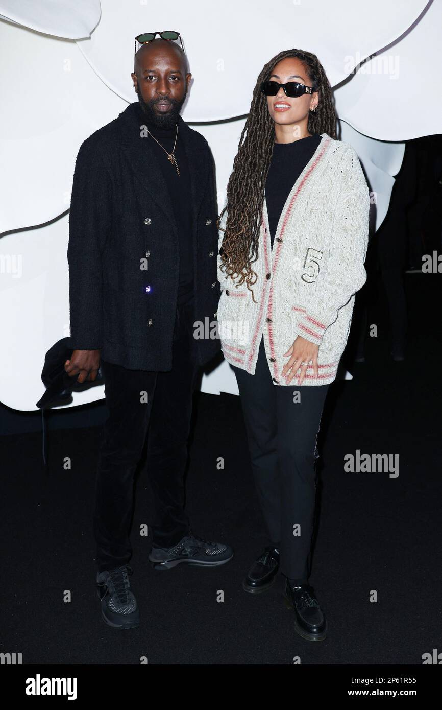 Paris, France. March 07, 2023 Ladj Ly and his wife attends the Chanel ...
