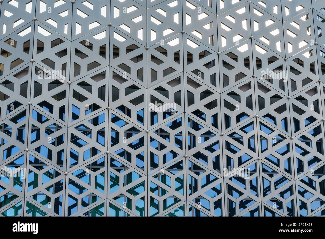 The texture of the cladding of a building made of metal aluminum panels ...