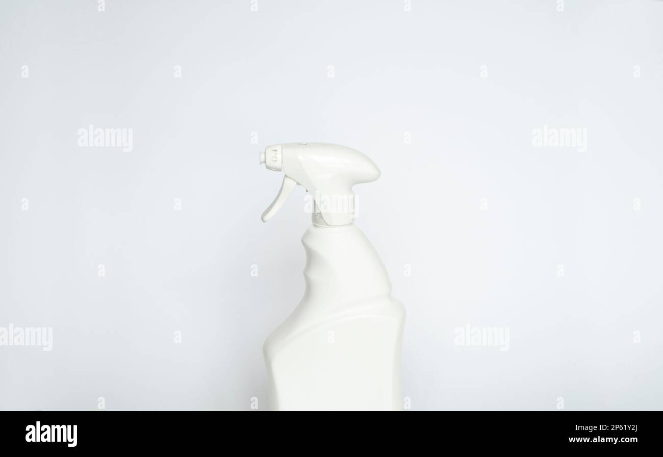 White plastic spray bottle for liquid cleaning products isolated on ...