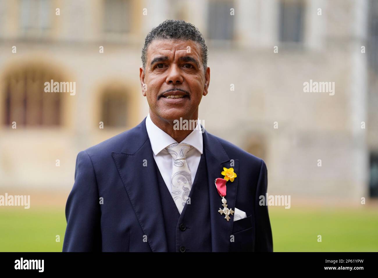 Christopher Kamara, from Wakefield, wears his Member of the Order of ...