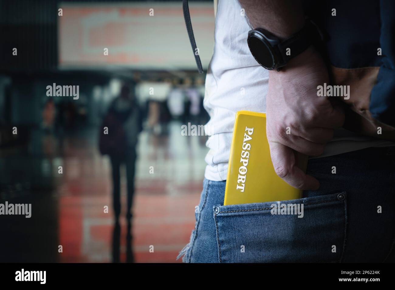 Closeup passports in pocket of jeans at airport. checking documents at ...