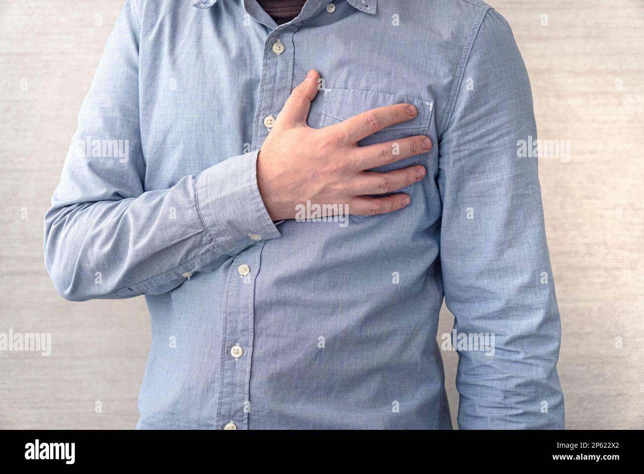 People, healthcare and problem concept. man suffering from heartache ...