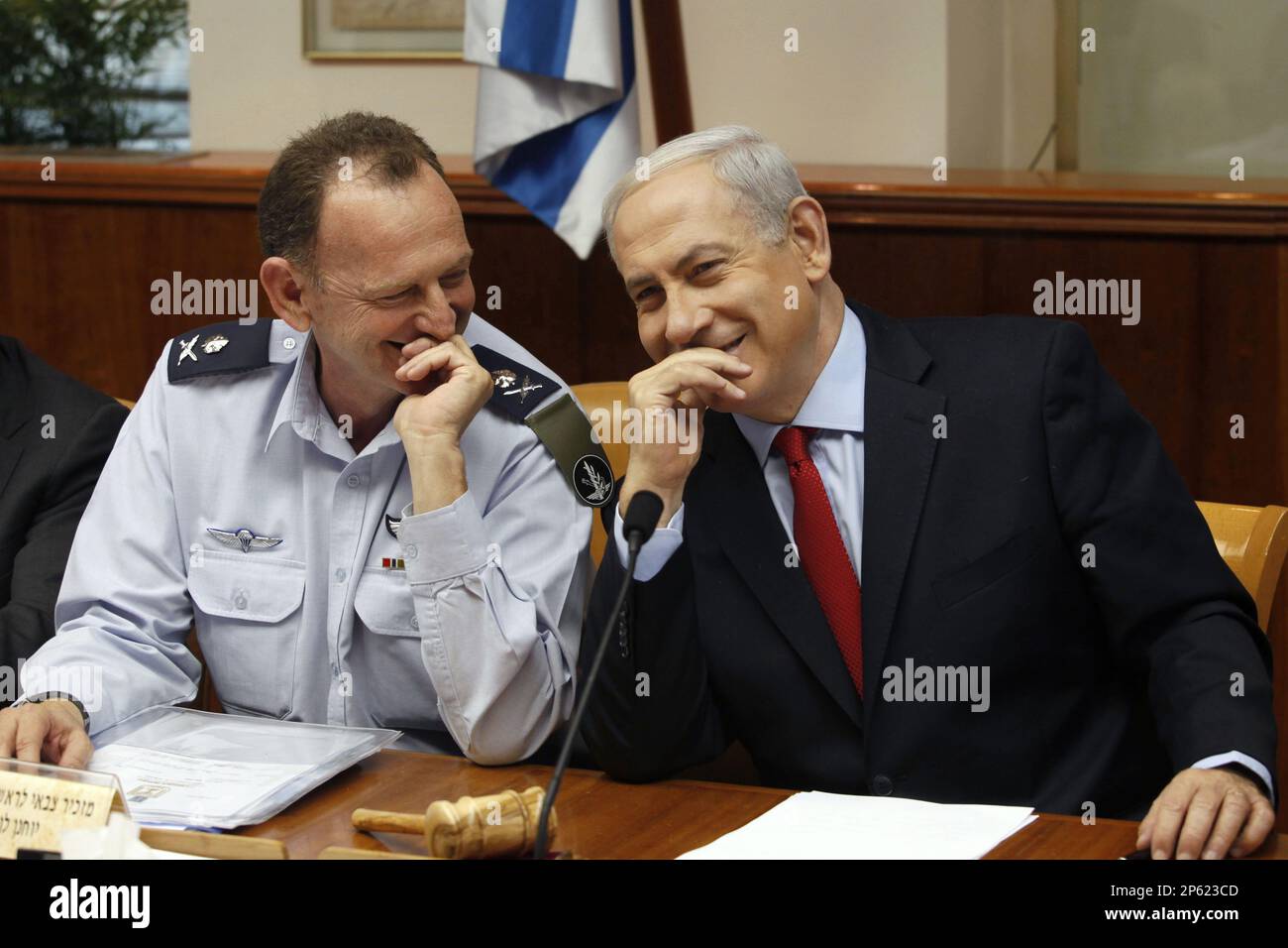 Israeli Prime Minister Benjamin Netanyahu, right, shares a laugh with ...