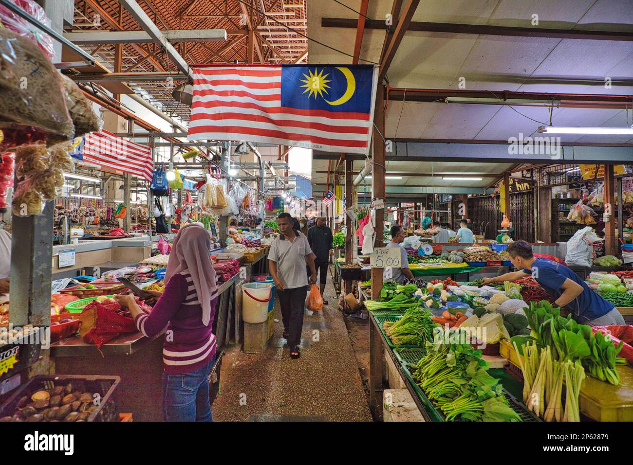 Kuala Lumpur, Malaysia - Jan 2023: in Chow Kit Market Vendors known for friendly and engaging ...