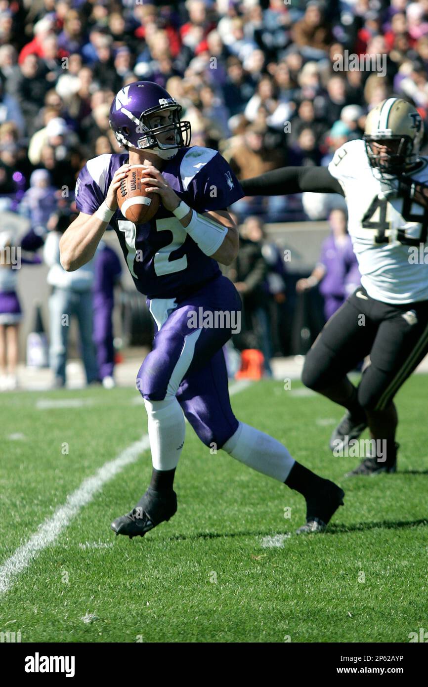 EVANSTON, IL - OCTOBER 14: Quarterback Andrew Brewer #12 of ...