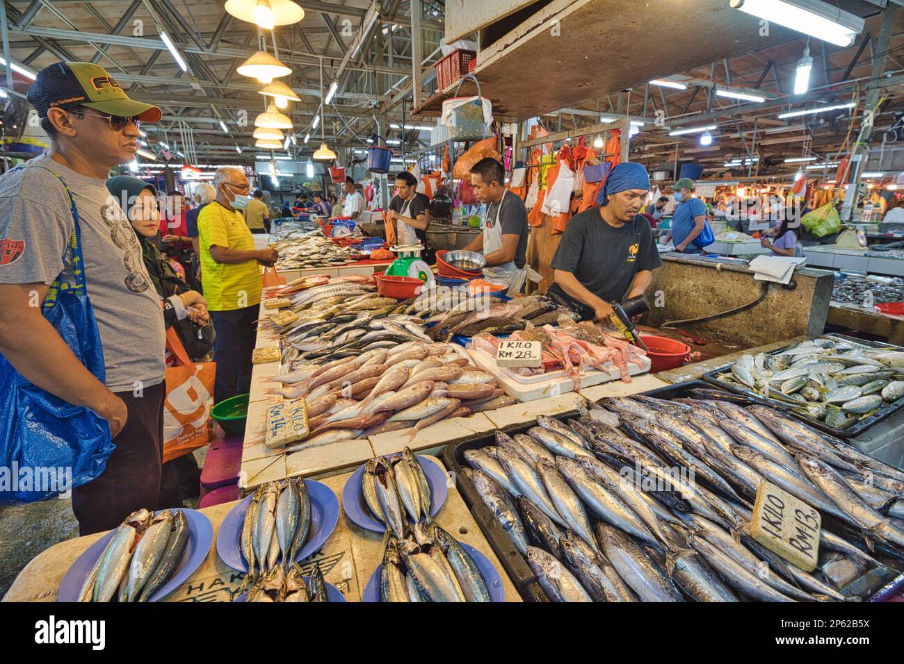 Kuala Lumpur, Malaysia - Jan 2023: Visitors of fish market can ...