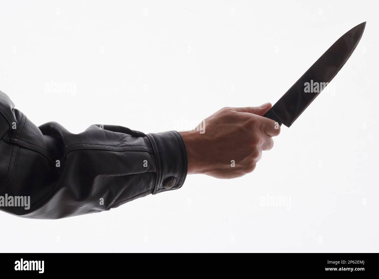 Criminal threatening to stab with large knife Stock Photo - Alamy