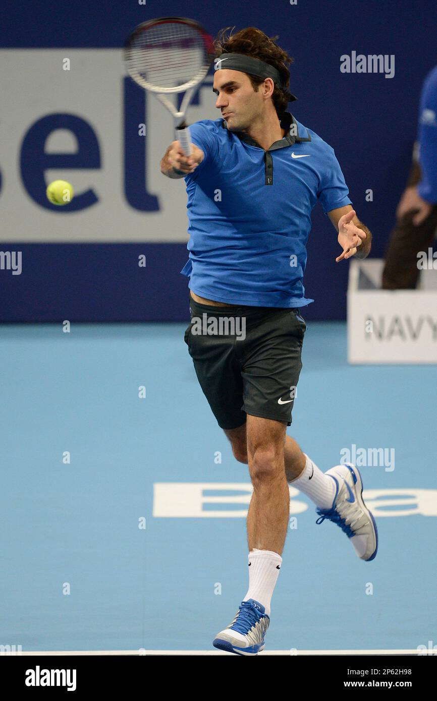 Switzerland's Roger Federer returns a ball to France's Paul-Henri ...