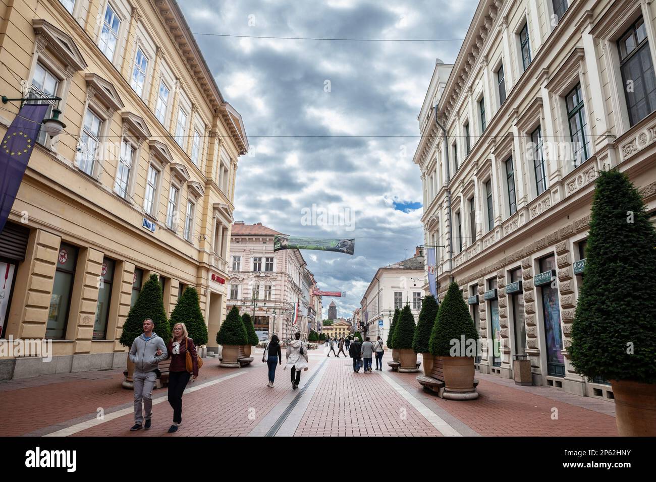 Picture of a street of the city center of Szeged, with its typical ...