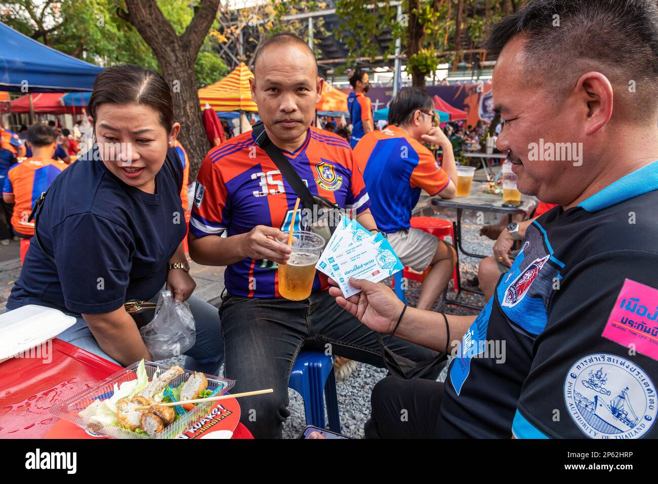 Thai football supporters eating and drinking before home game, Klong ...