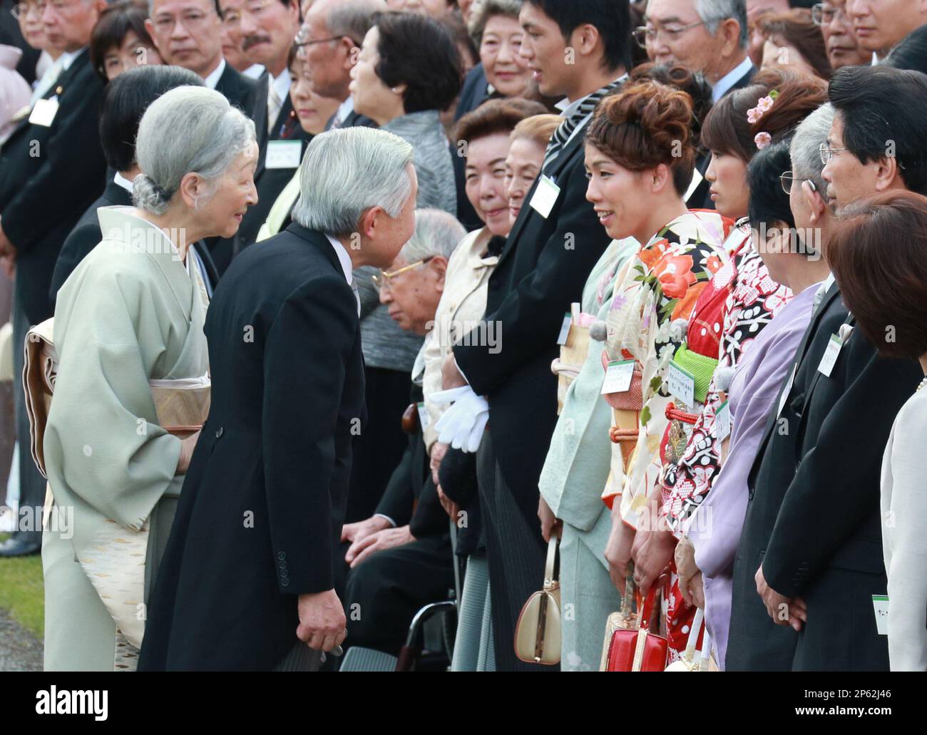 Emperor Akihito and Empress Michiko speak to Saori Yoshida (6th from R ...