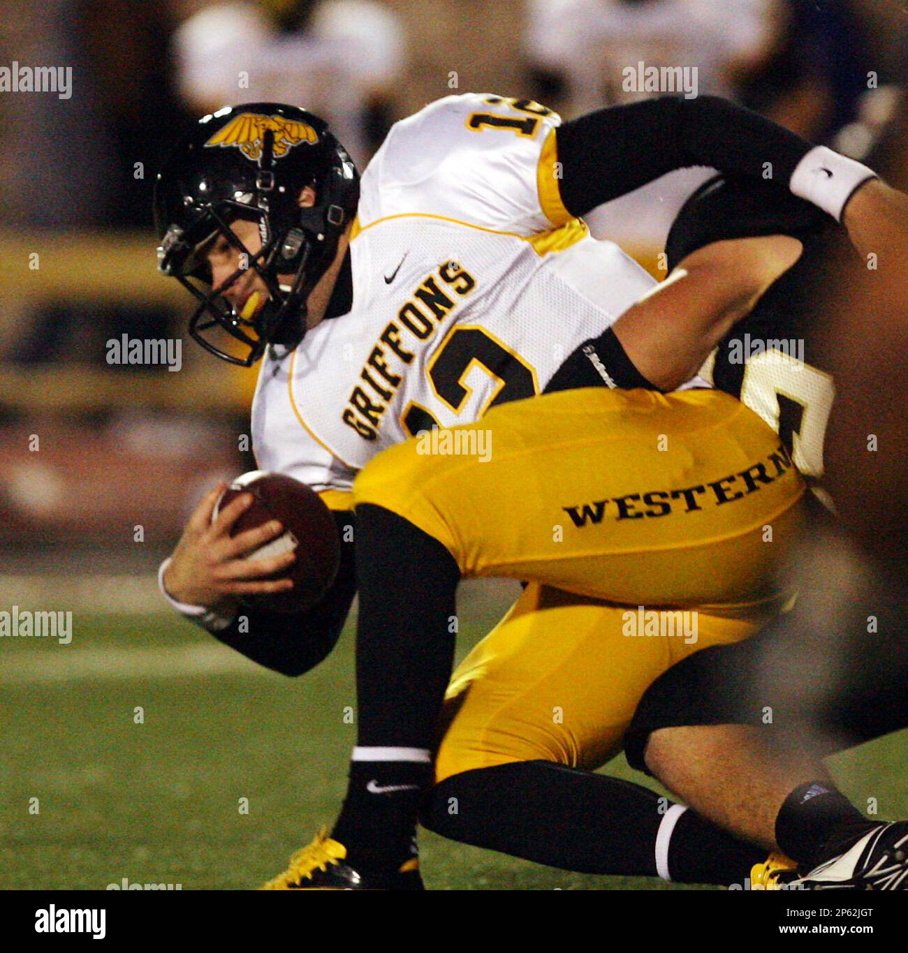 Emporia State's Ben Carlson (35) brings down Missouri Western's Travis ...