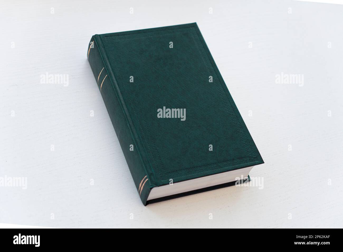green hardcover book on white background with copy space Stock Photo ...