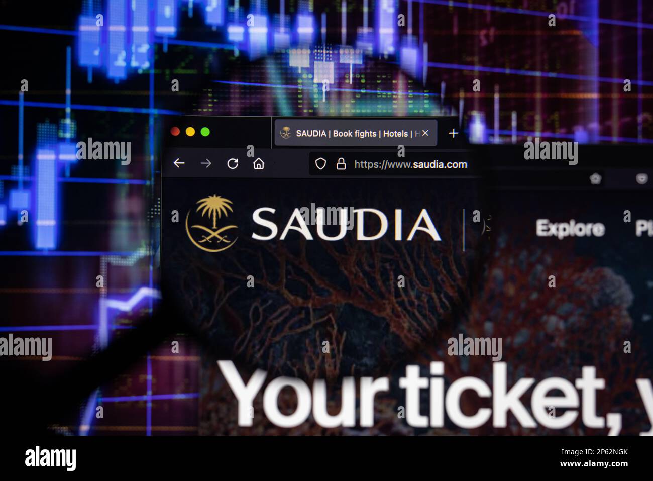 Saudia airline company logo on a website with blurry stock market ...