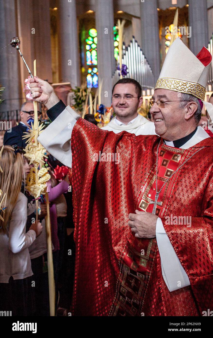 Bishop blessing the palms,mass,Palm Sunday.Interior of Basilica Sagrada ...