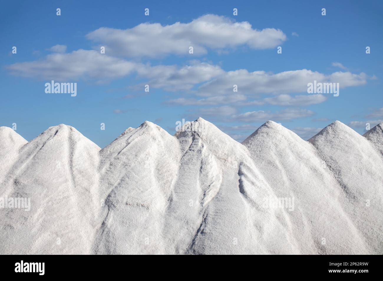 piles of salt at salt evaporation pond of Salinas de s'Avall in Colonia ...